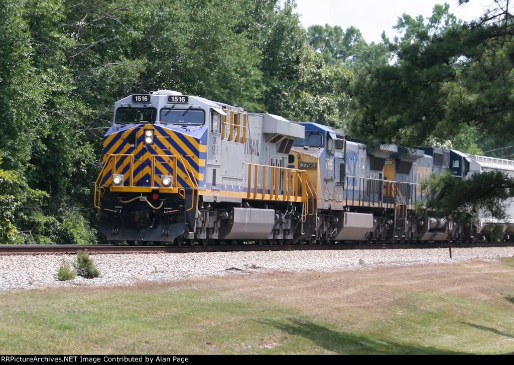 CREX ES44AC 1516 leads CSX C40-8Ws 7796 and 7906